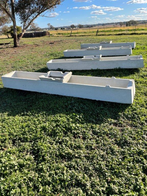 Lot 45 - Tumby concrete troughs x 4 | AuctionsPlus