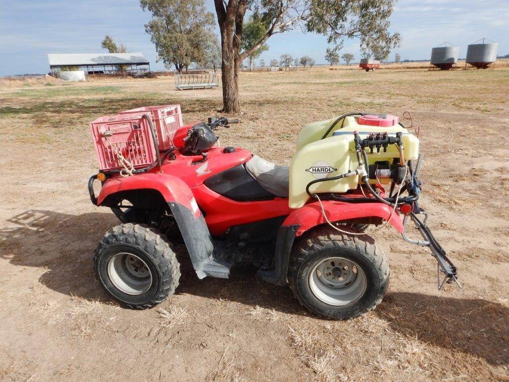 Lot 102 - Honda quad (350) with hardi spray unit and boom | AuctionsPlus