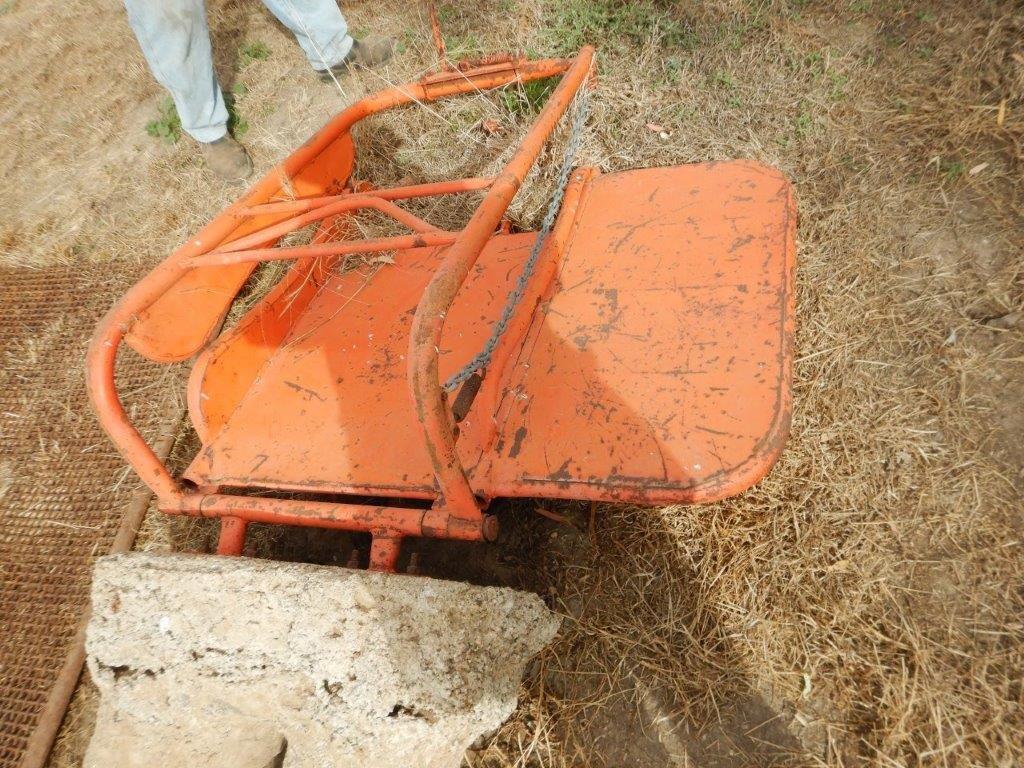 Lot 144 - Orange calf branding cradle | AuctionsPlus