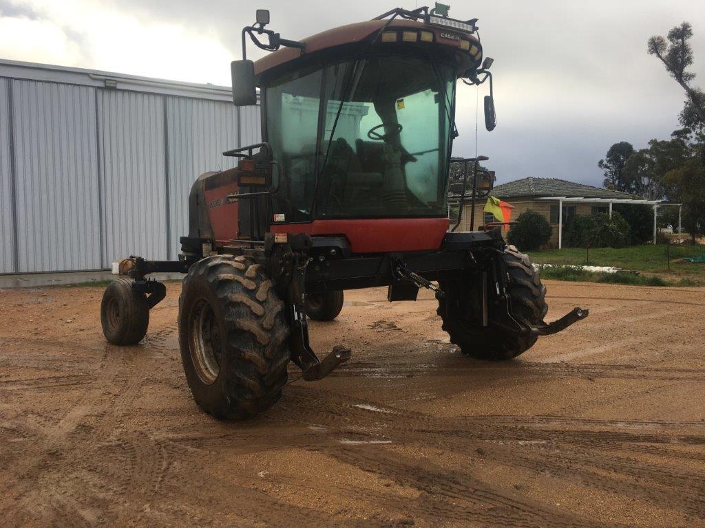 Lot 6 - Case IH 2303 Windrower | AuctionsPlus