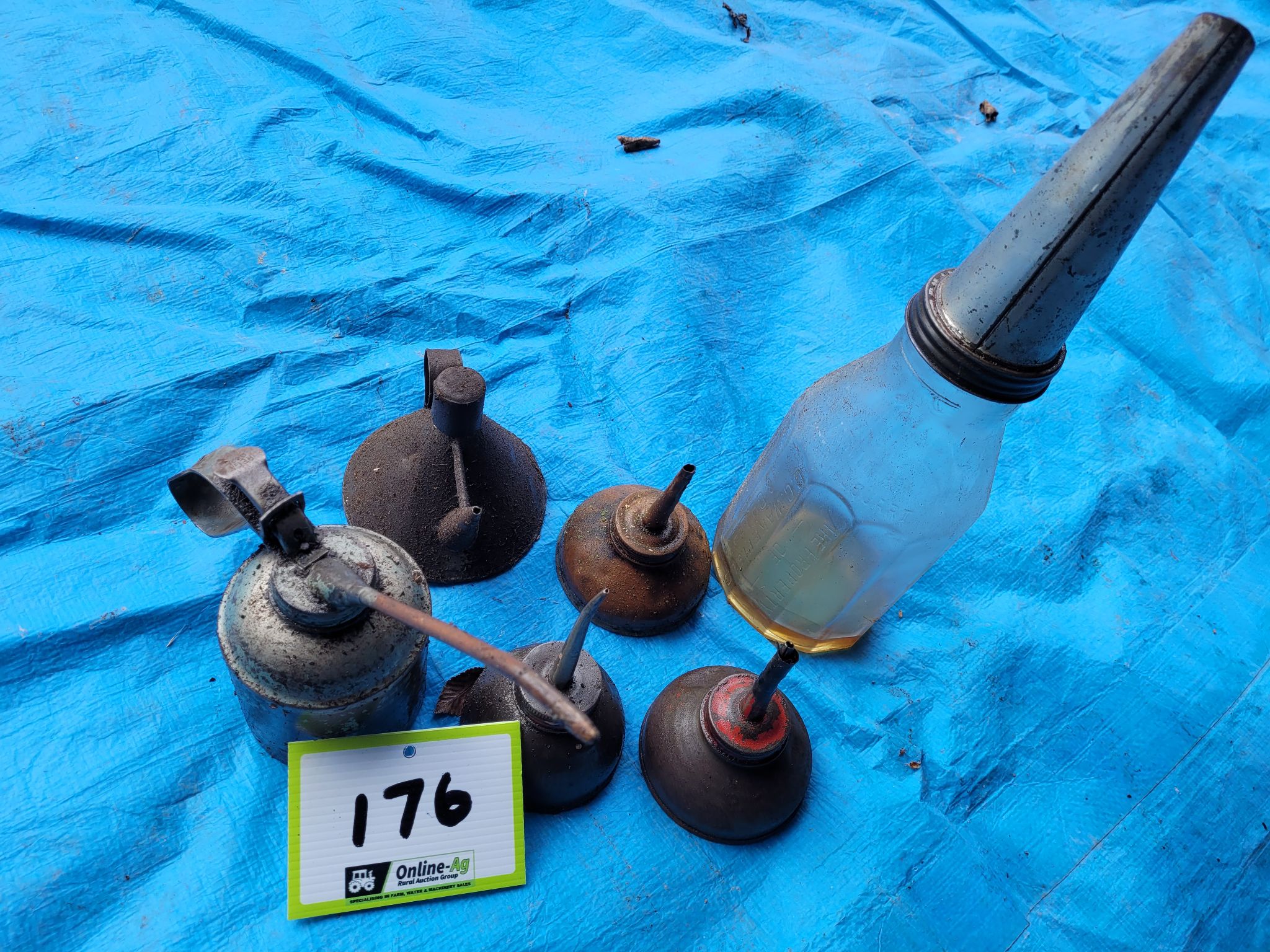 Lot 176 - Oil Cans & Oil Bottle | AuctionsPlus