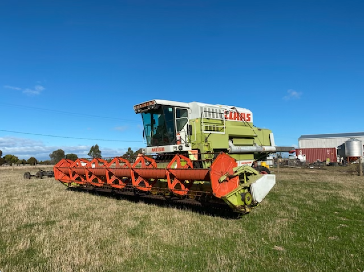 Lot 1 - Claas Mega 204 Header with 9 meter front | AuctionsPlus