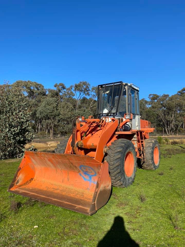 Lot 26 - Hitachi LX70 Loader | AuctionsPlus