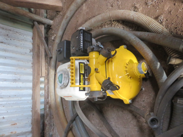 Lot 204 - Davey fire fighter with hose | AuctionsPlus