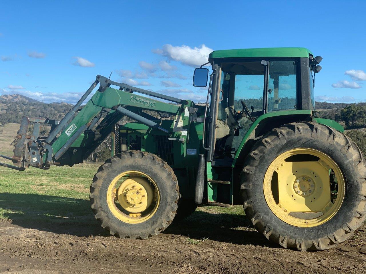 Lot 9 - JOHN DEERE 6410 TRACTOR W/ FEL | AuctionsPlus