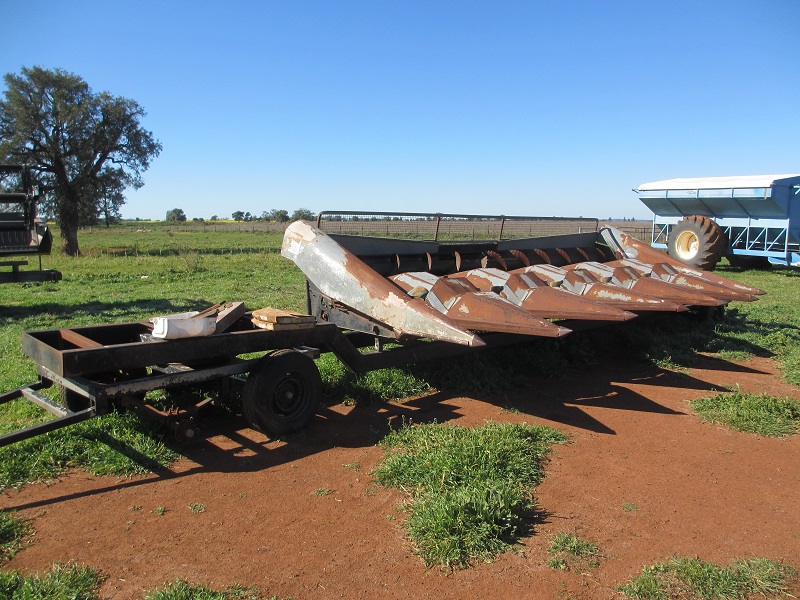 Lot 12 - Agco corn front & Comb trailer | AuctionsPlus