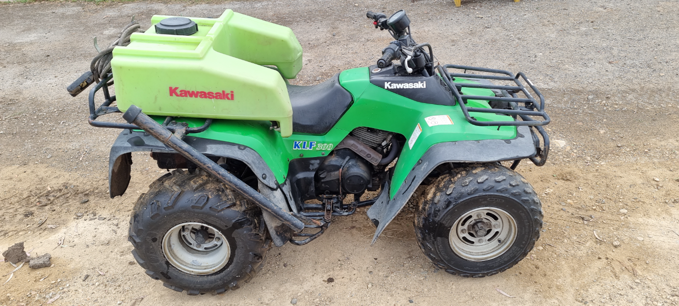 Lot 140 - KAWASAKI KLF 300 QUAD BIKE WITH SPRAY TANK | AuctionsPlus