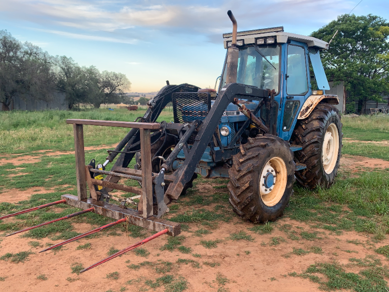 31 - Ford 7610 with loader. | AuctionsPlus