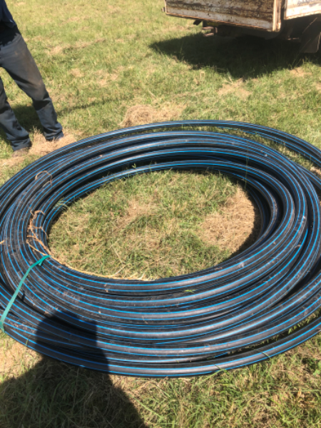 Lot 74 - 3/4 roll of blue line 2'' poly pipe | AuctionsPlus