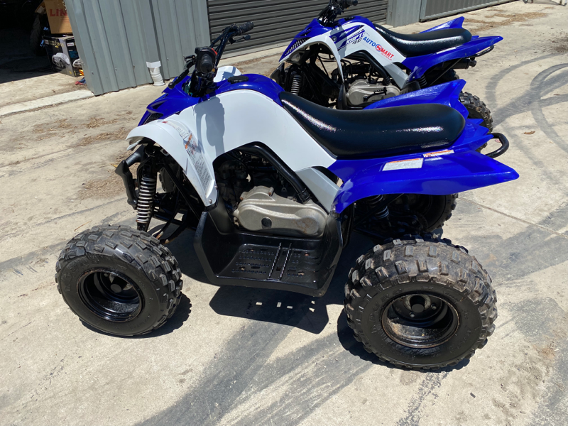 Lot 15 - Yamaha YFM90R Raptor 90 youth quad | AuctionsPlus