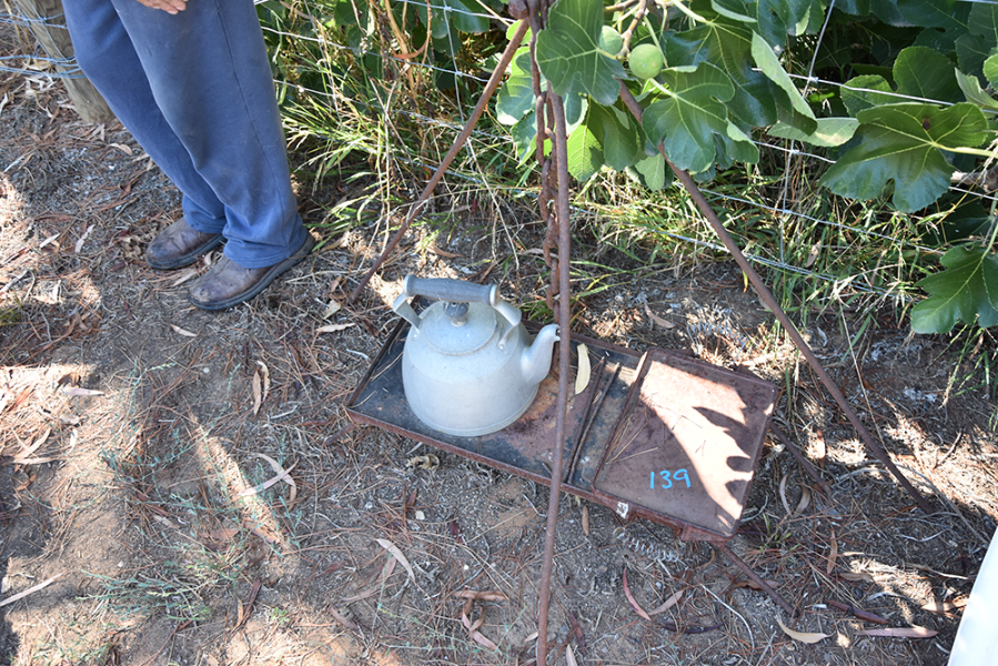 139 - Tripod with fire plate/stand | AuctionsPlus