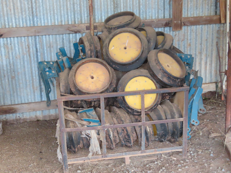 Lot 113 - 48 Equalizer Press Wheels & Scrapers | AuctionsPlus