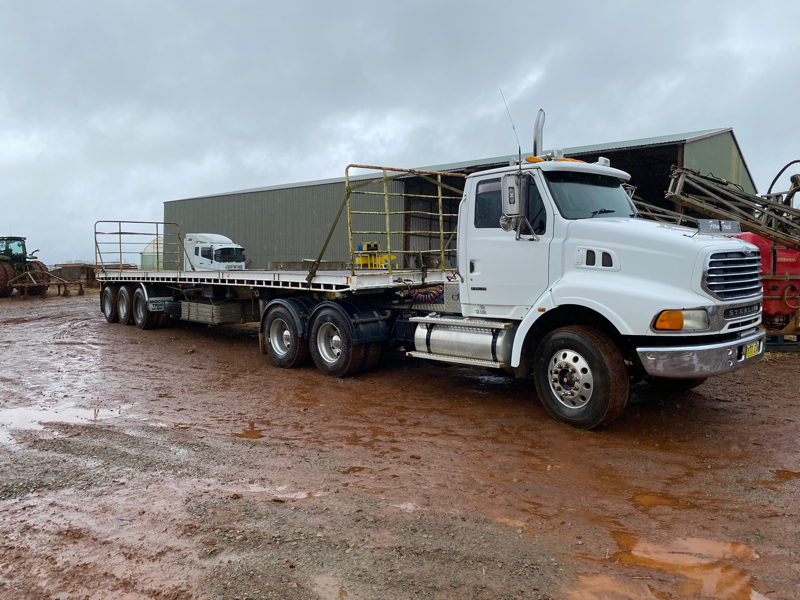 Lot 8 - Sterling prime mover & 41 foot flatbed tri-axle trailer ...