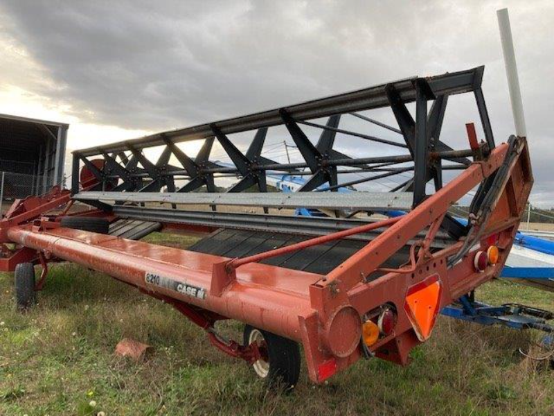 Lot 34 - CASE IH 8210 21’ tow behind Windrower | AuctionsPlus
