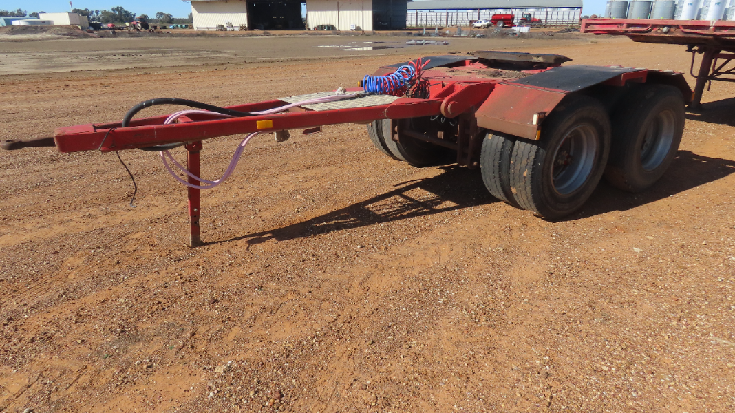 Lot 27 - Fruehauf bogie axel farm dolly | AuctionsPlus