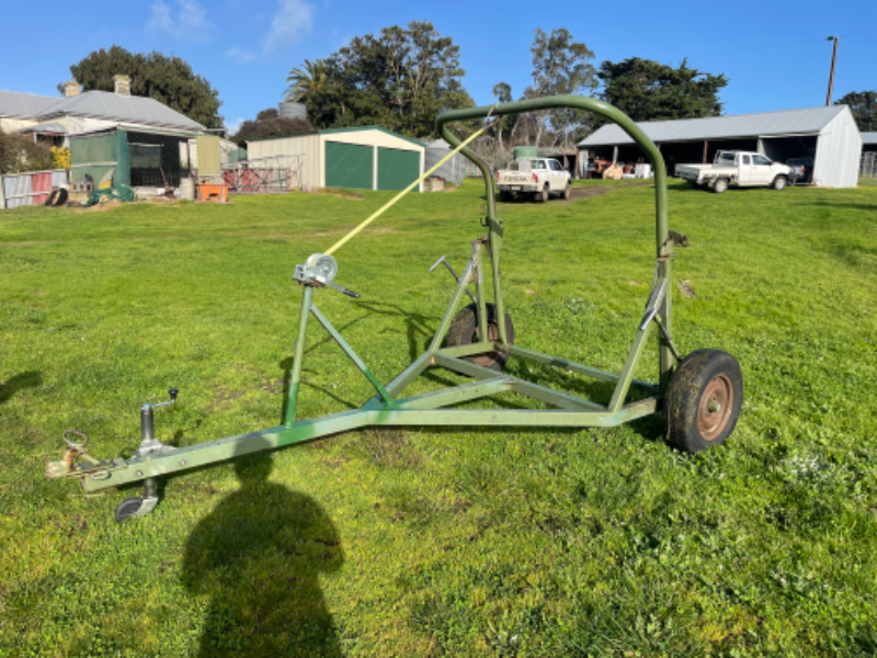Lot 57 - Round hay bale carrier with hand winch (new) with no rust on ...