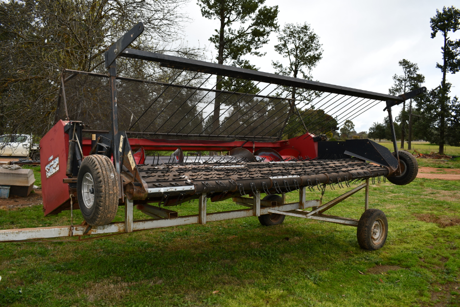 Lot 14 - Phillips canola front with trailer | AuctionsPlus