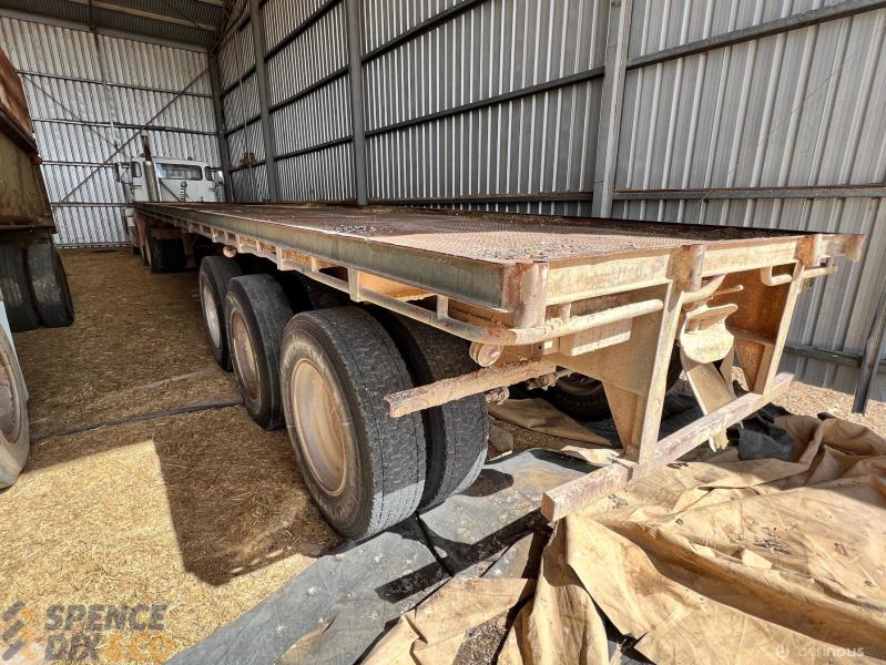 Lot 52 - 40ft McGrath Flat Top Tri Axle Trailer | AuctionsPlus