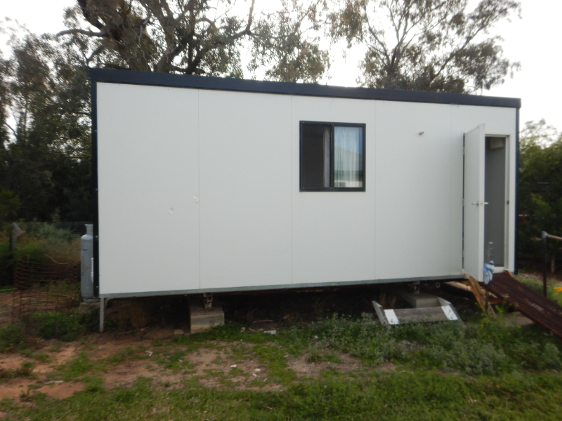 Lot 84 - Single unit insulated donga with gas Hot water & refrigerated ...