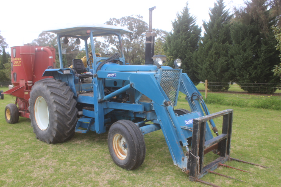 Lot 9 - 7710 Ford Tractor with Loader | AuctionsPlus