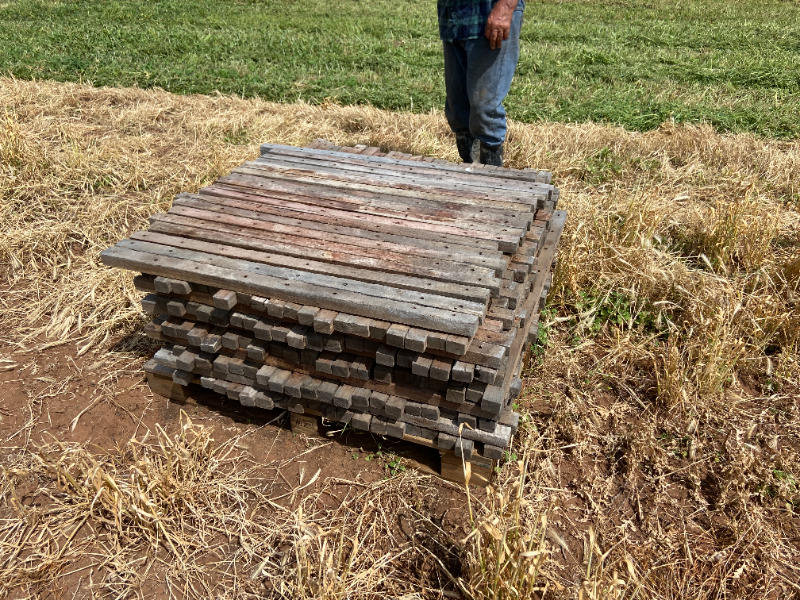 Lot 56 - 1x Pallet Timber Fence Droppers (approx 200) | AuctionsPlus