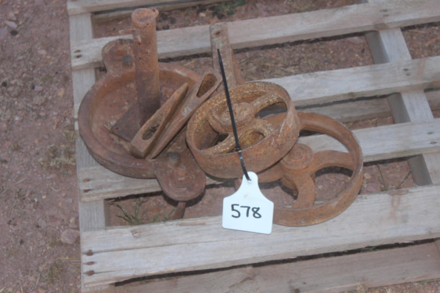 Lot 578 - Steel Wheels & Axe Handles | AuctionsPlus