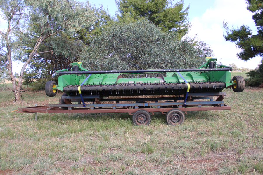 Lot 21 - John Deere 915 Canola Pick Up Front | AuctionsPlus