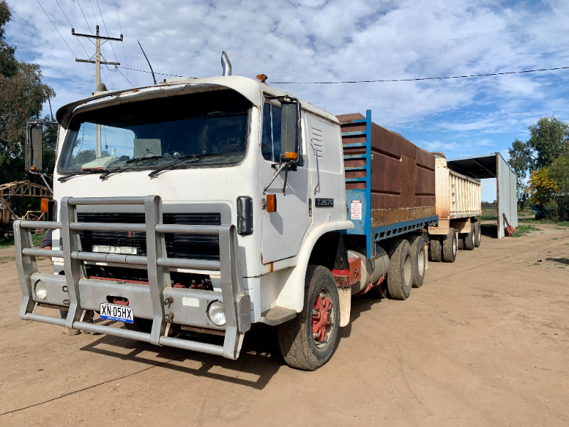 Lot 23 - International T-Line Truck with Dog Trailer | AuctionsPlus