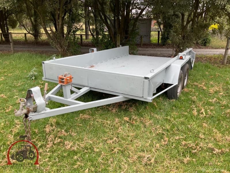 Lot 60 - Tandem trailer c/w ramps and winch | AuctionsPlus