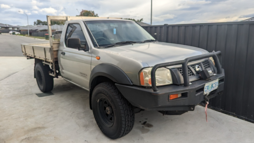 Lot 170 - 2003 Nissan Navara DX 3.0 Di 4x4 Single Cab Flat Tray Ute | AuctionsPlus