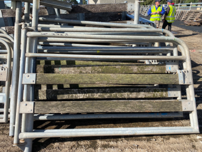 Lot 216 - Round Bar Gates with Timber Infills | AuctionsPlus