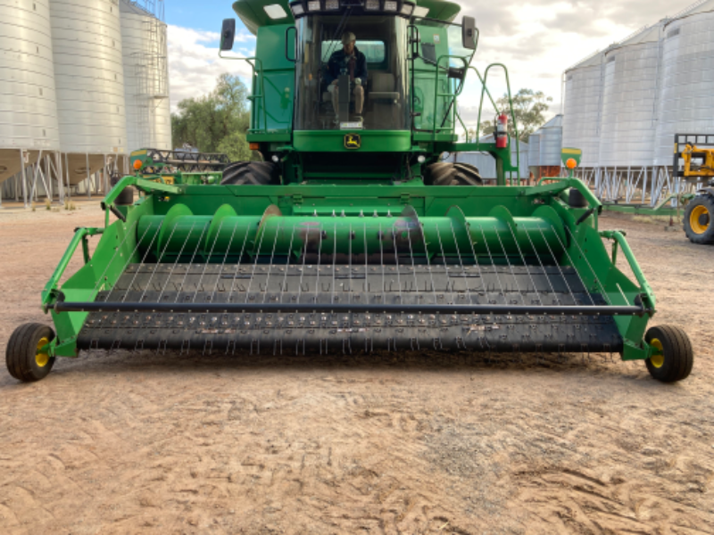 Lot 9 - John Deere 615P canola front | AuctionsPlus