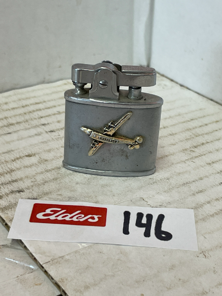 Lot 146 - Plane lighter | AuctionsPlus