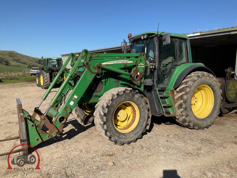 Lot 129 - John Deere 6920 with 741 front end loader | AuctionsPlus
