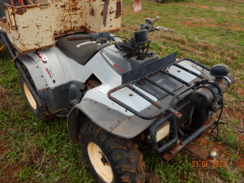 Lot 27 - ATV + Spray Unit | AuctionsPlus