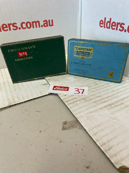 Lot 37 - 2x tins | AuctionsPlus