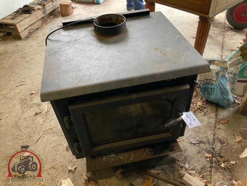 Lot 51 - Heatilator solid fuel heater, incs flu | AuctionsPlus