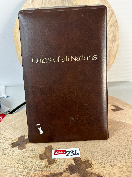 Lot 236 - Coins of All Nations Folder - includes Stamp and Coin ...