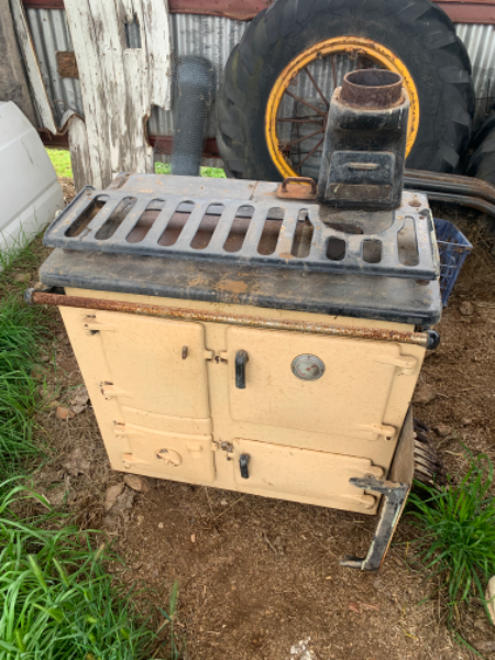 Lot 34 - Rayburn wood burner Stove with water jacket | AuctionsPlus
