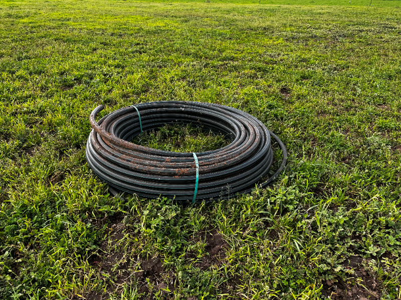 Lot 83 - 1x 150m x 1.5' Poly Pipe roll | AuctionsPlus