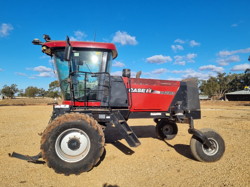 Lot 22 - Case WD2303 Windrower with 36ft Front | AuctionsPlus