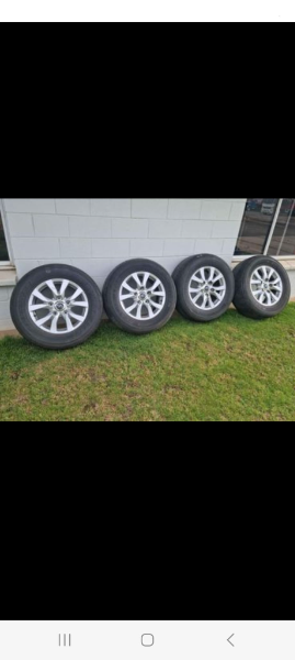 Lot 64 - Landcruiser 200 series sahara rims & tyres, hardware 20% tread ...