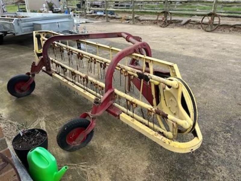 Lot 31 - NH Roller Bar Hay Rake | AuctionsPlus
