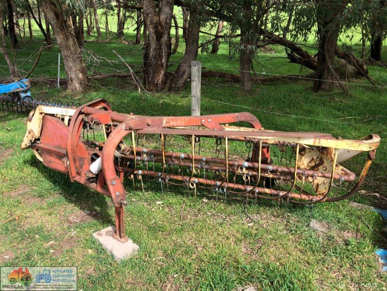 Lot 44 - 3pl New Holland Roller Bar Hay Rake ~ PTO Drive | AuctionsPlus