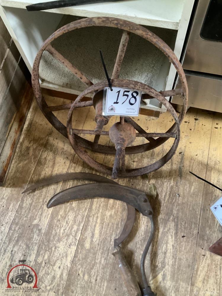 Lot 158 - 2 Steel wheel barrow wheels and 2 fern hooks. | AuctionsPlus