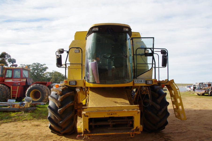 Lot 76 - New Holland TX65 plus Header with 30ft comb | AuctionsPlus
