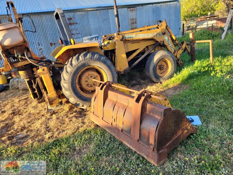 Lot 37 - MF-202 Industrial FEL Tractor/Backhoe | AuctionsPlus
