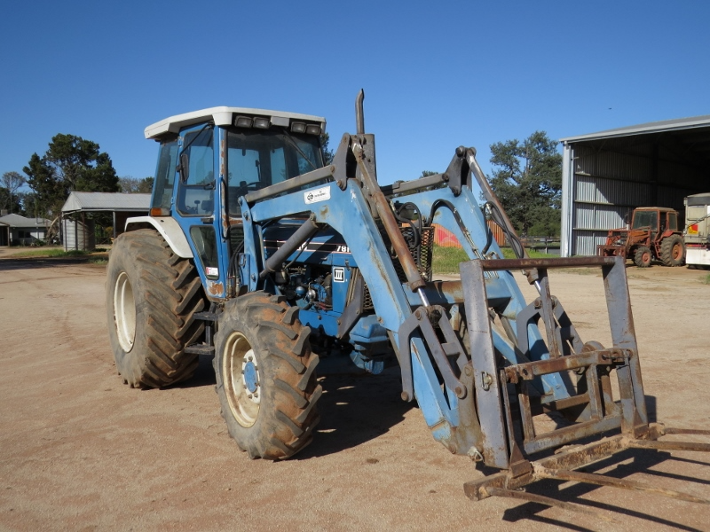 Ford 7810 FWA tractor, front end loader with bucket & hay forks ...