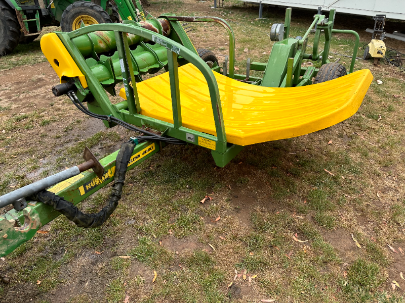 Lot 5 - HUSTLER FEED OUT MACHINE | AuctionsPlus