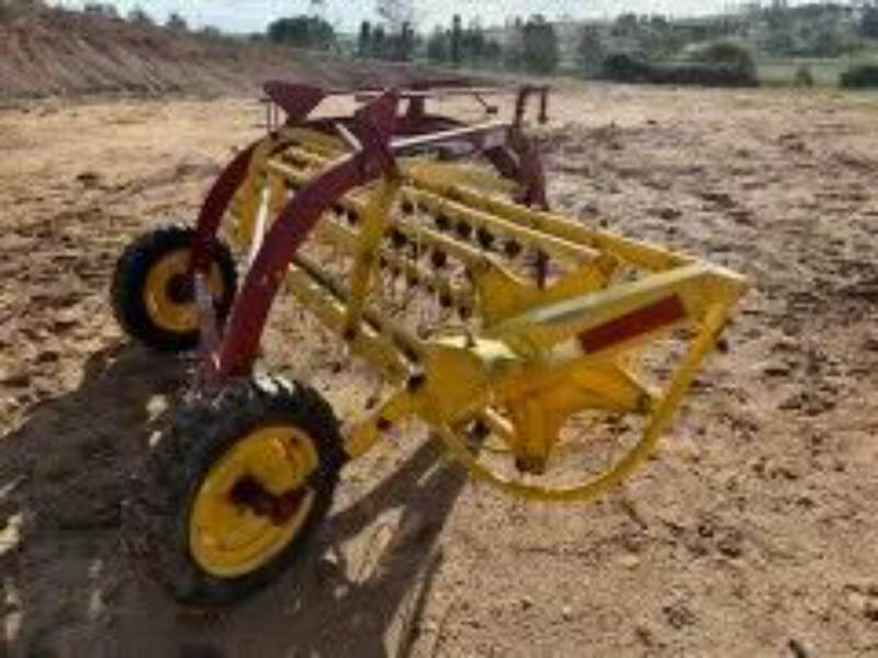 Lot 53 - New Holland 260 Roller Bar Hay Rake | AuctionsPlus